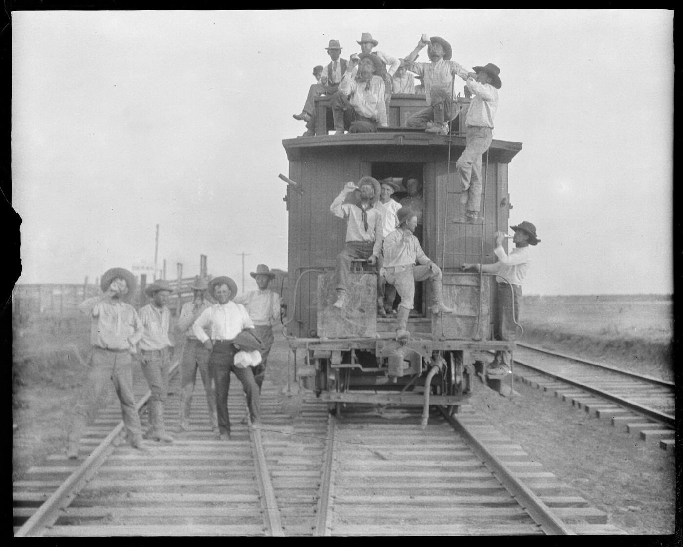 Some Matador Ranch cowboys celebrating at the railroad yard after ...