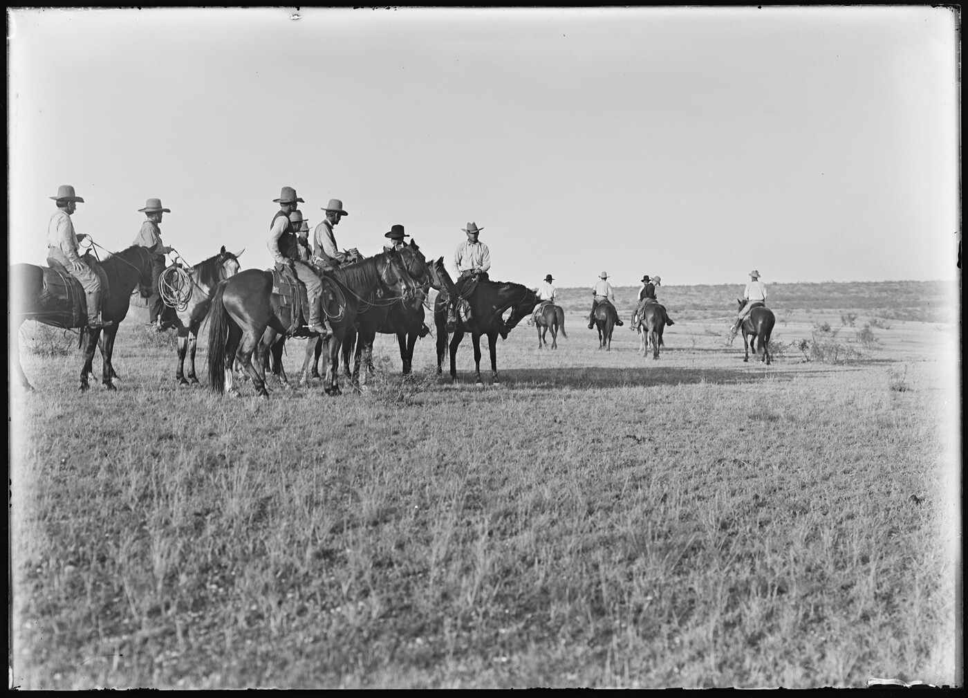 Spur cowpunchers of the Spur outfit planning the work ahead and ...